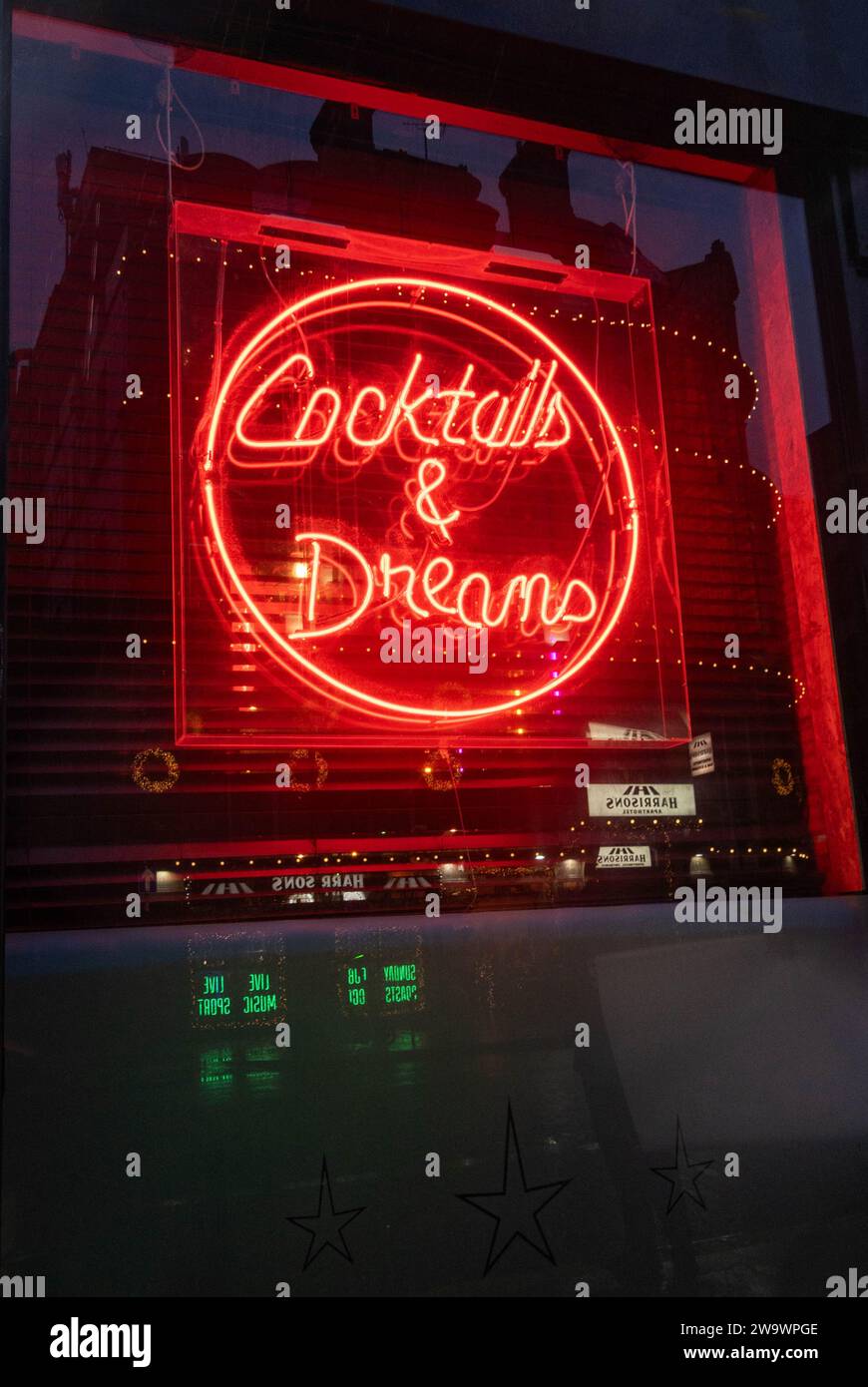 Cocktails & Dreams neon sign in window of a bar in Liverpool Stock ...