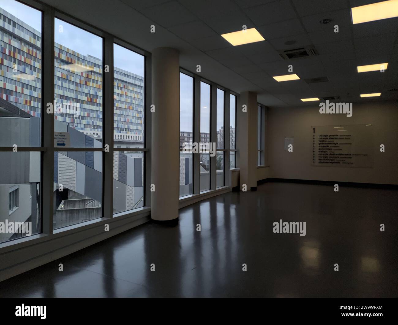 Corridor of a hospital with windows showing the outside Stock Photo - Alamy