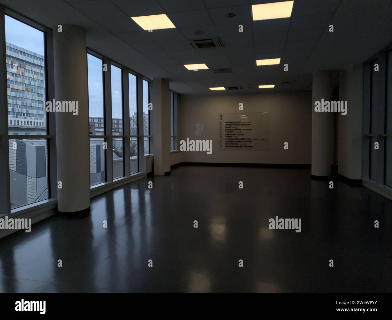 Corridor of a hospital with windows showing the outside Stock Photo - Alamy