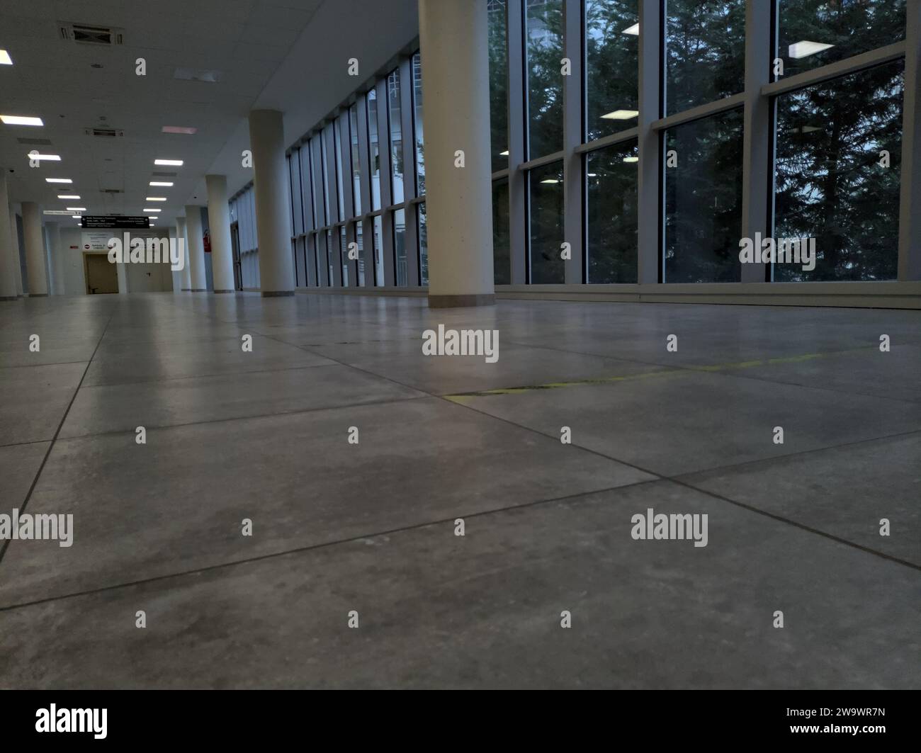 Corridor of a hospital with windows showing the outside Stock Photo - Alamy