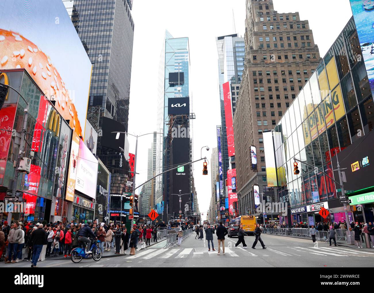 New York, United States. 30th Dec, 2023. Pedestrians walk in Times ...
