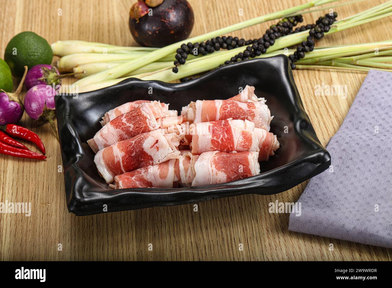 Raw beef bacon roll for grill Stock Photo - Alamy