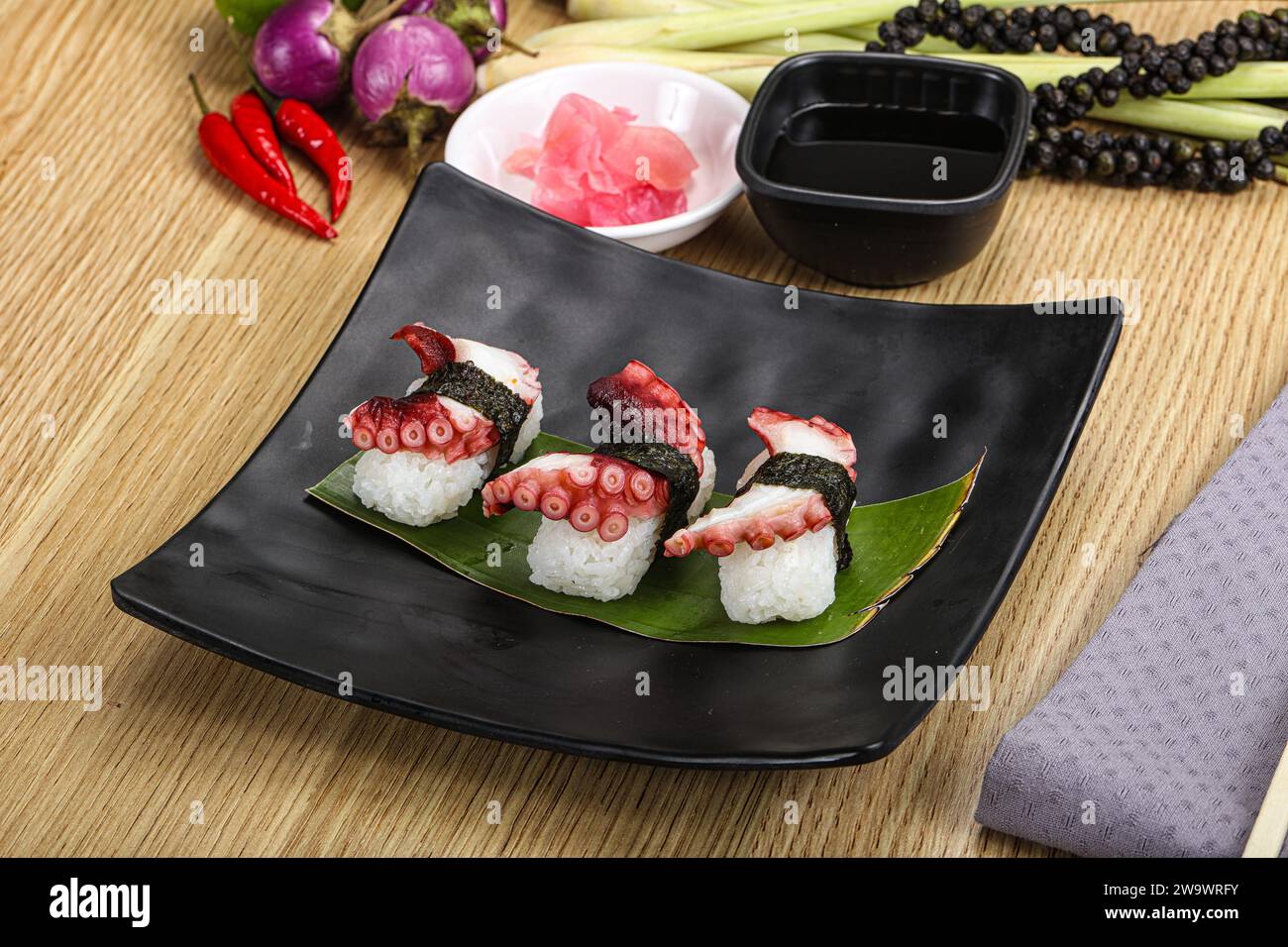 Japanese cuisine - sushi with octopus served ginger Stock Photo - Alamy