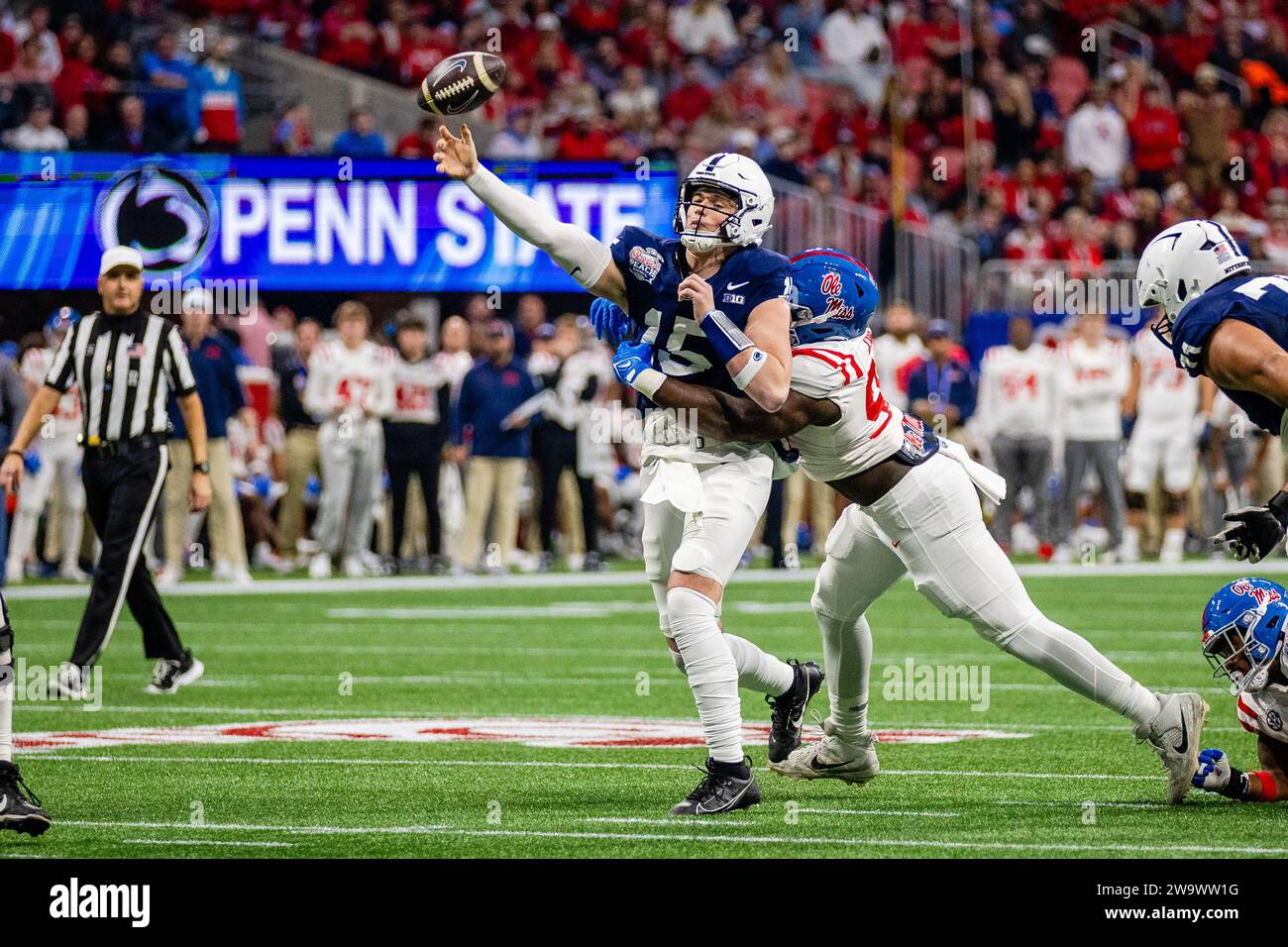 December 30, 2023: Penn State quarterback Drew Allar (15) is hit by ...
