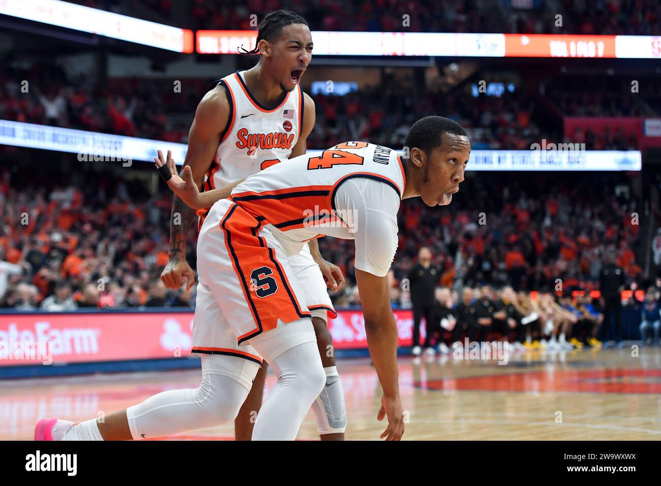 Syracuse guard Quadir Copeland, right, celebrates with guard Judah