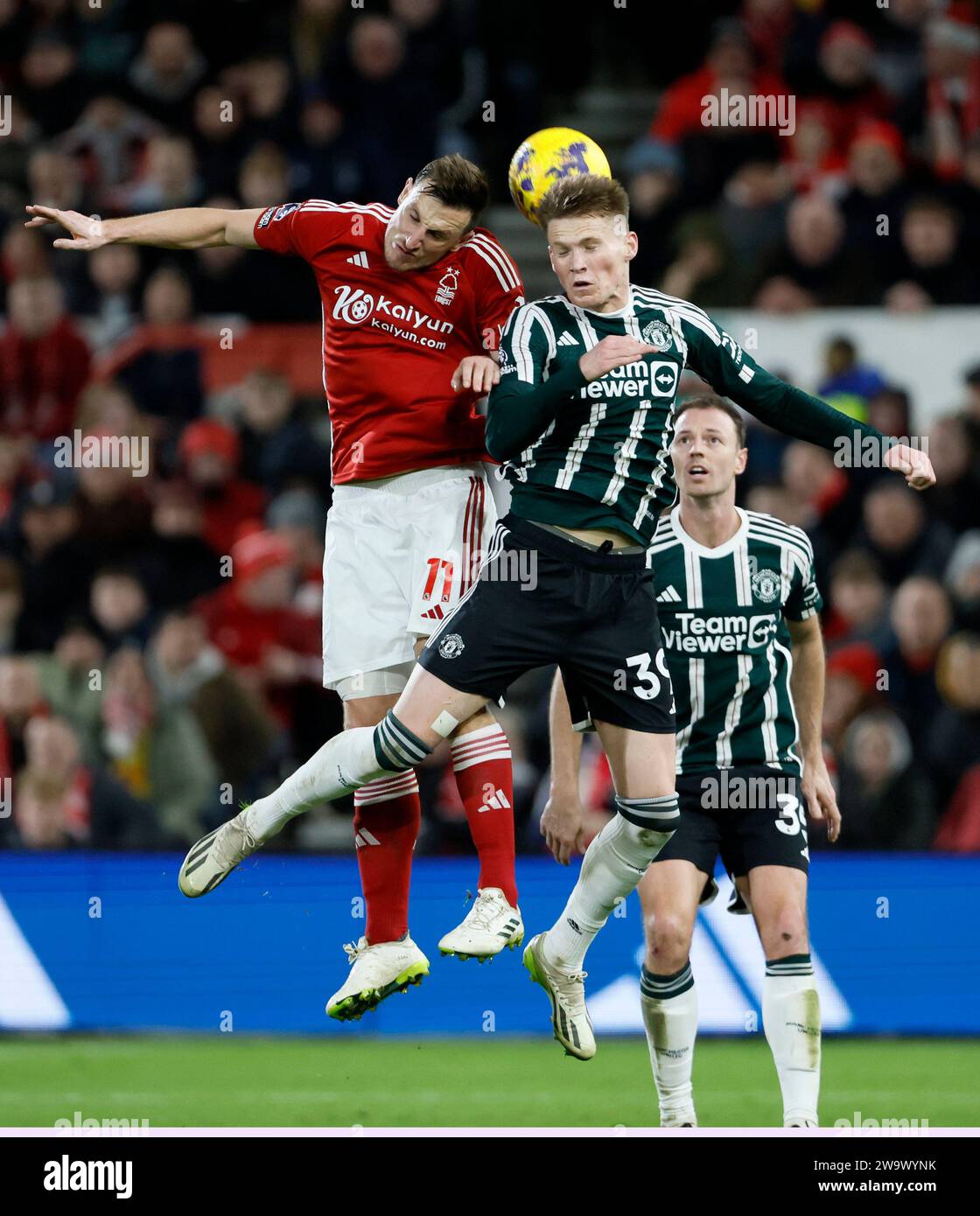 Nottingham Forest's Chris Wood (left) and Manchester United's Scott ...