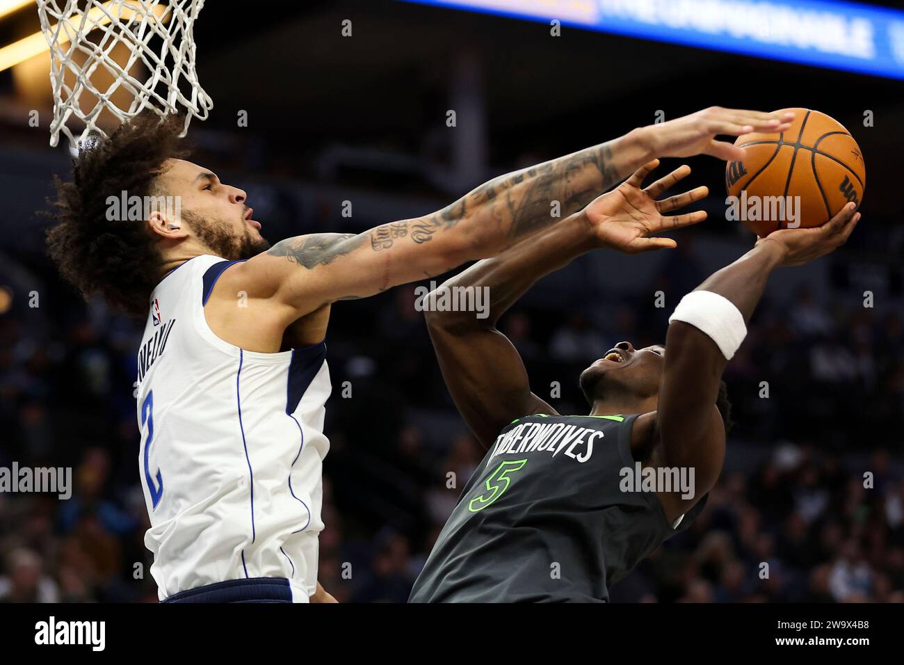 Minnesota Timberwolves guard Anthony Edwards (5) shoots as Dallas ...
