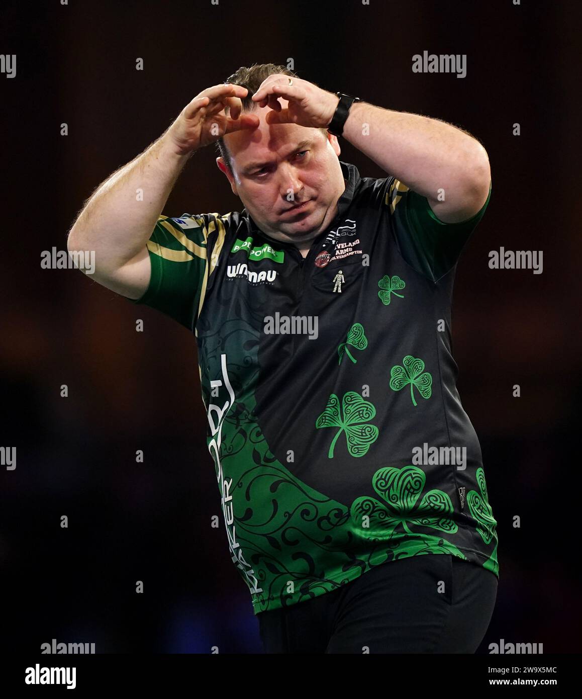 Brendan Dolan in action against Gary Anderson (not pictured) on day ...