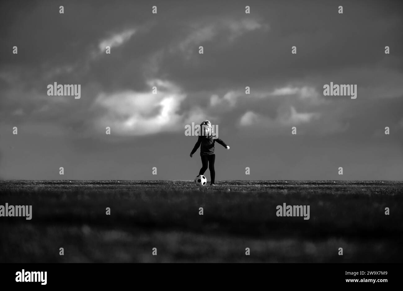 Kid playing soccer, happy child enjoying sports football game, kids ...