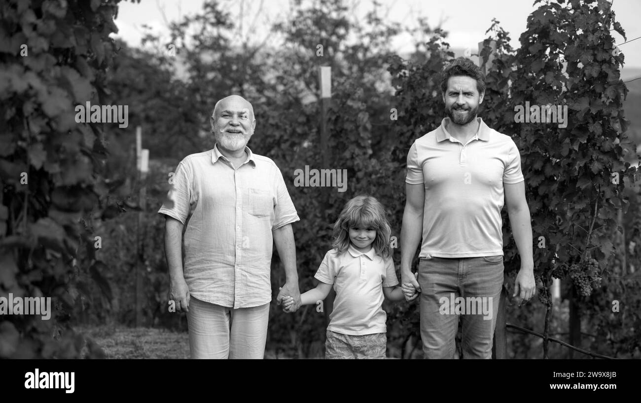 Three generations of caucasian men. Boy child with father and old ...