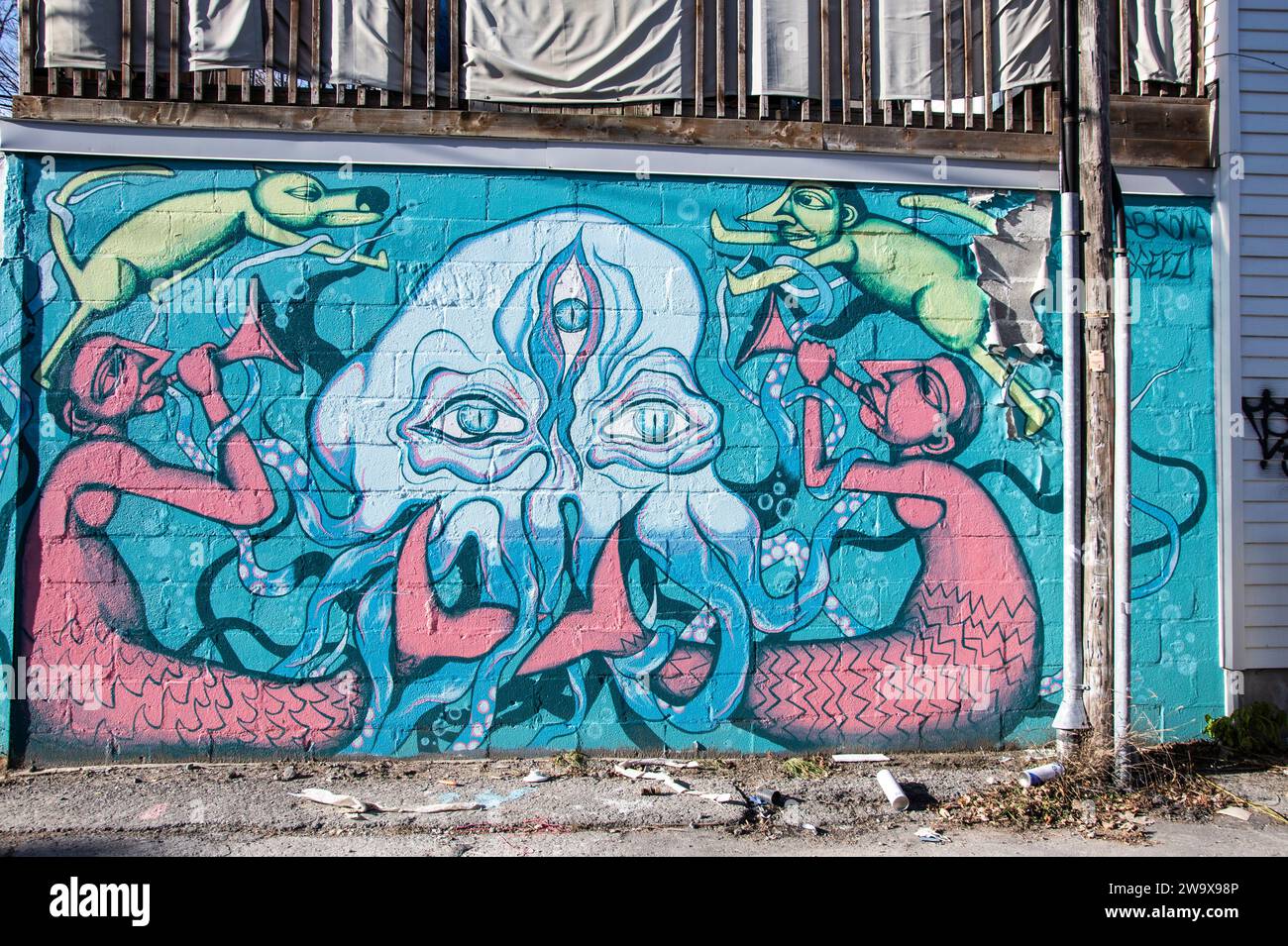 Octopus and mermaids playing horns mural in Hochelaga neighborhood in ...