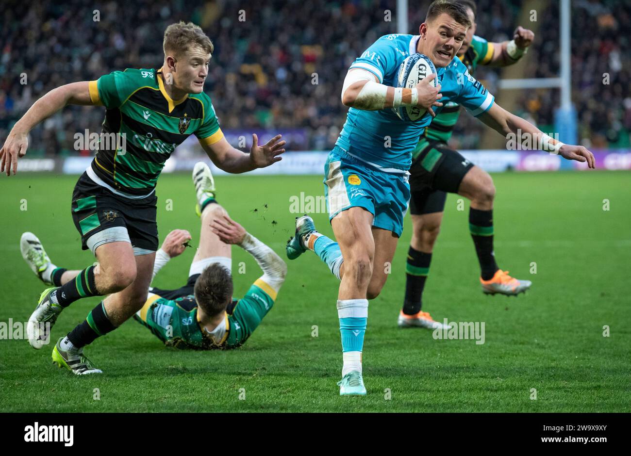 Northampton Saints Fin Smith and Sale Sharks Joe Carpenter in action ...