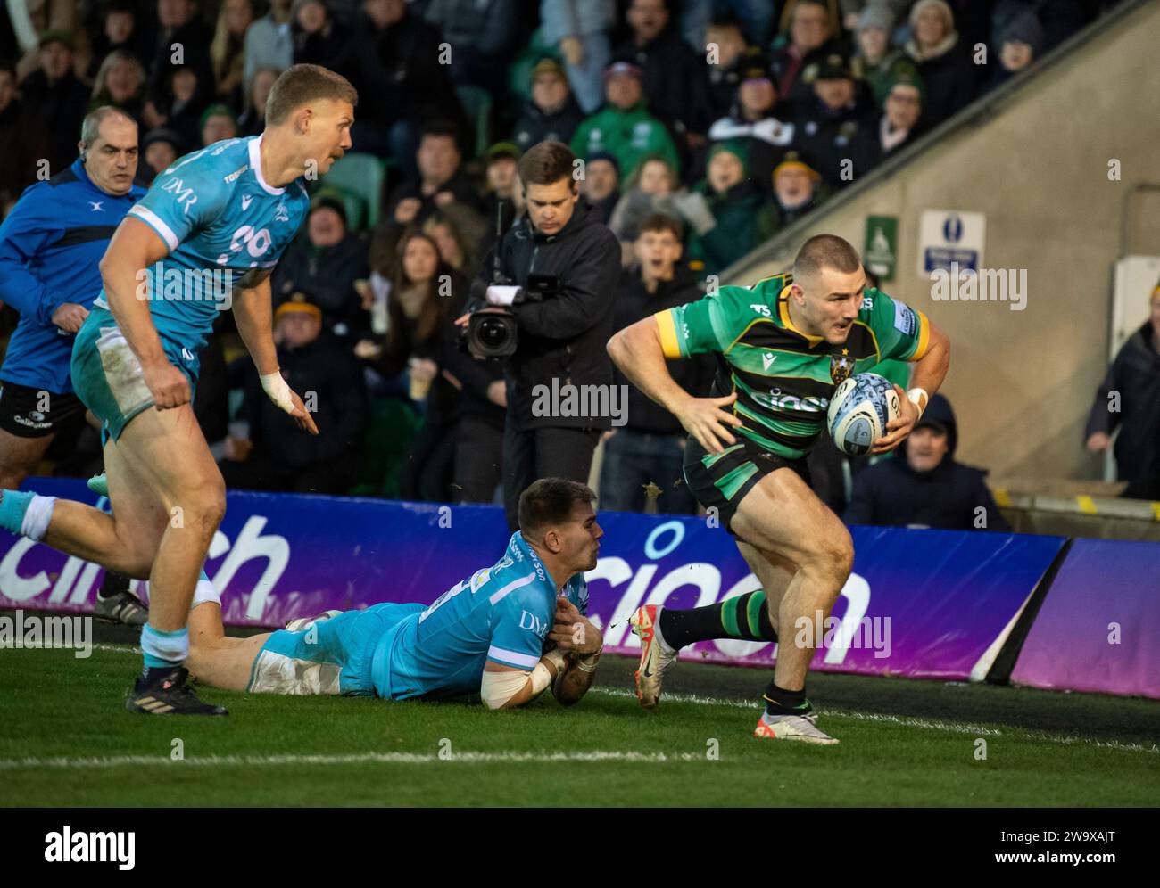 Sale Sharks Joe Carpenter and Northampton Ollie Sleightholme in action ...