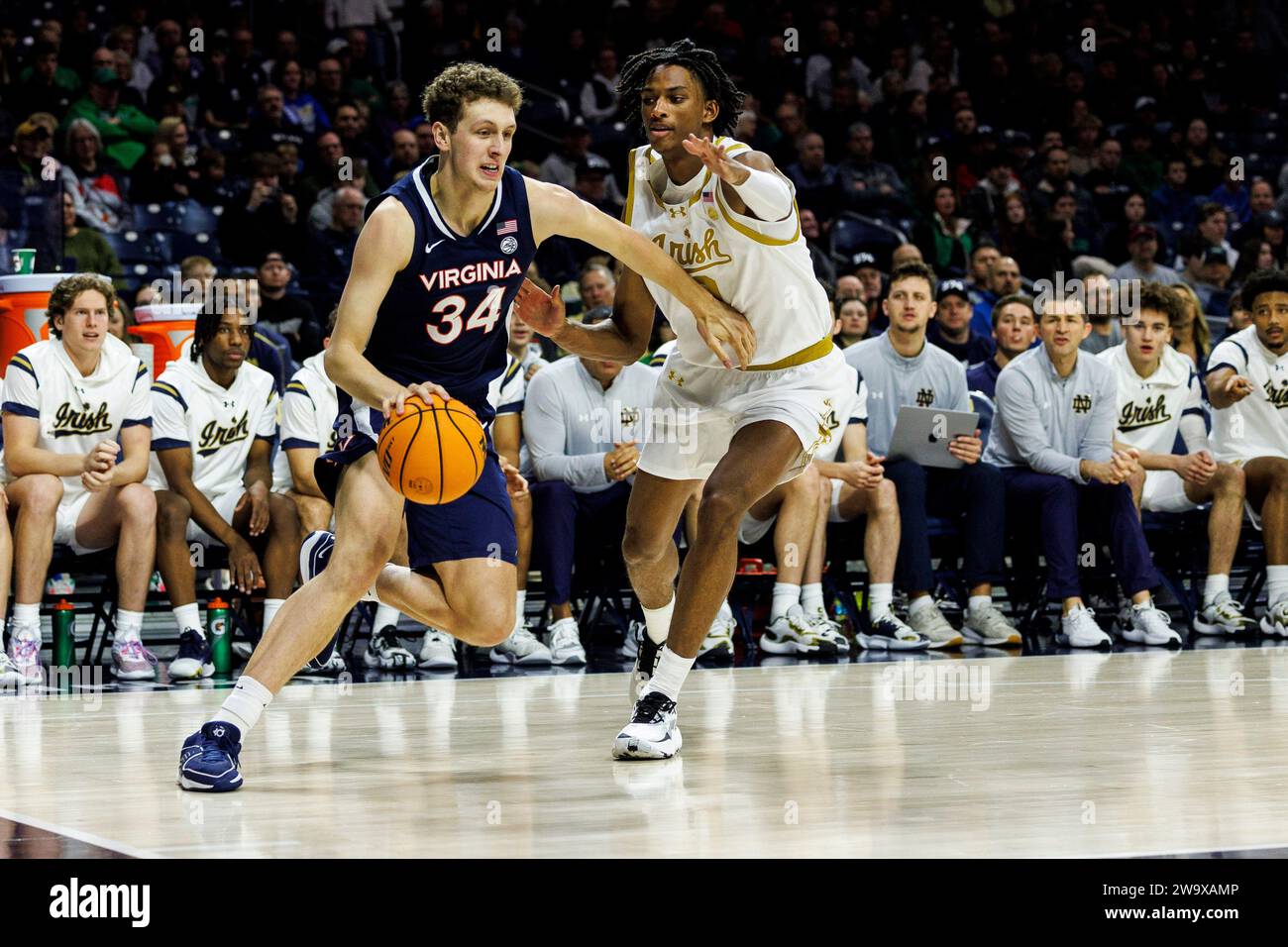 South Bend, Indiana, USA. 30th Dec, 2023. Virginia forward Jake Groves ...