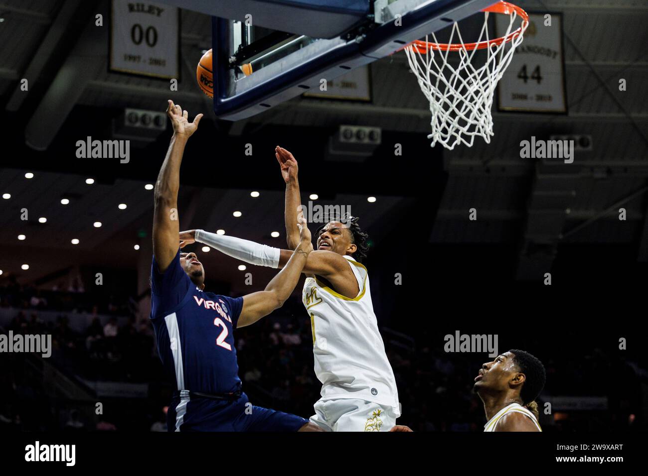 South Bend, Indiana, USA. 30th Dec, 2023. Virginia guard Reece Beekman ...