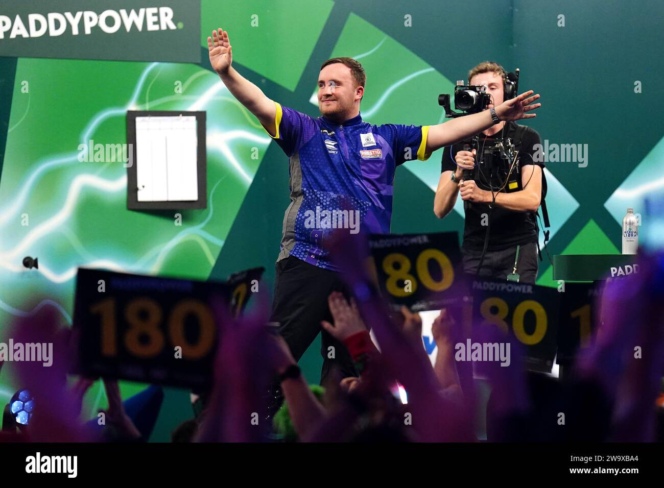 Luke Littler celebrates victory over Raymond van Barneveld (not ...