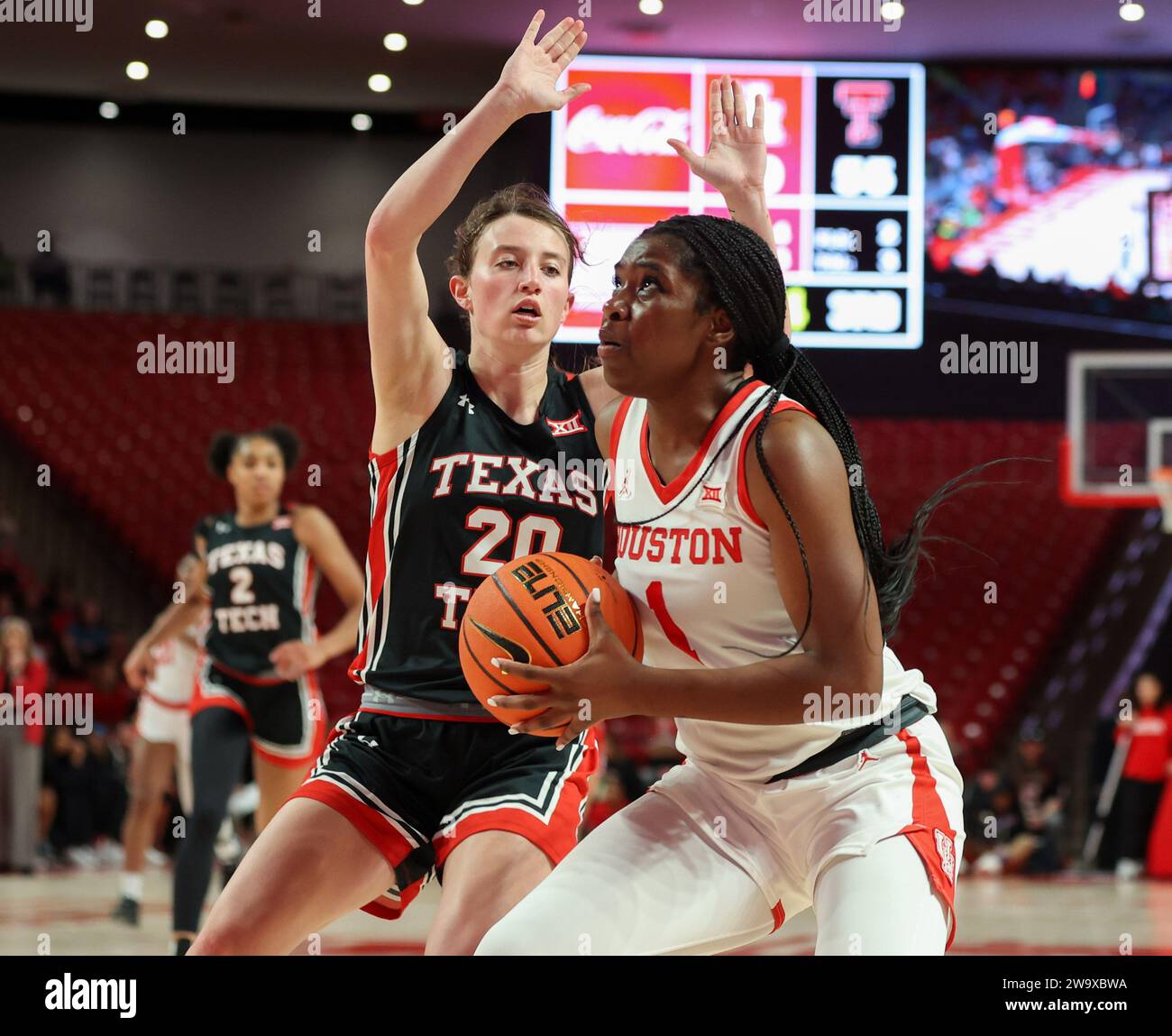December 30, 2023: Houston forward Bria Patterson (1) looks for a shot ...