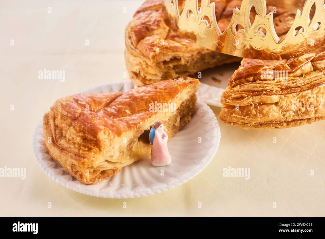 Epiphany cake on wooden table. Galette des rois traditional Epiphany ...