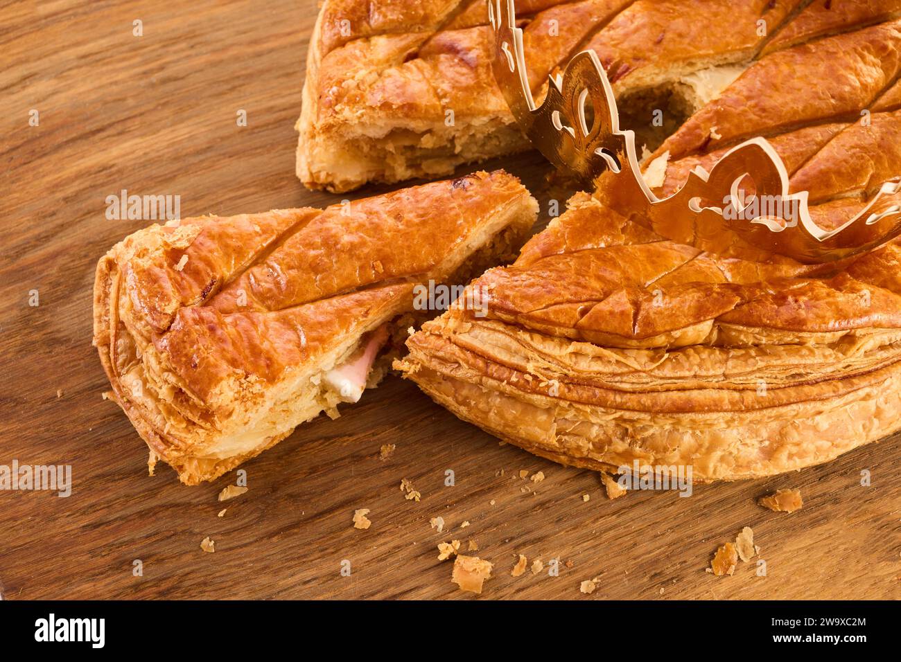 Epiphany cake on wooden table. Galette des rois traditional Epiphany ...