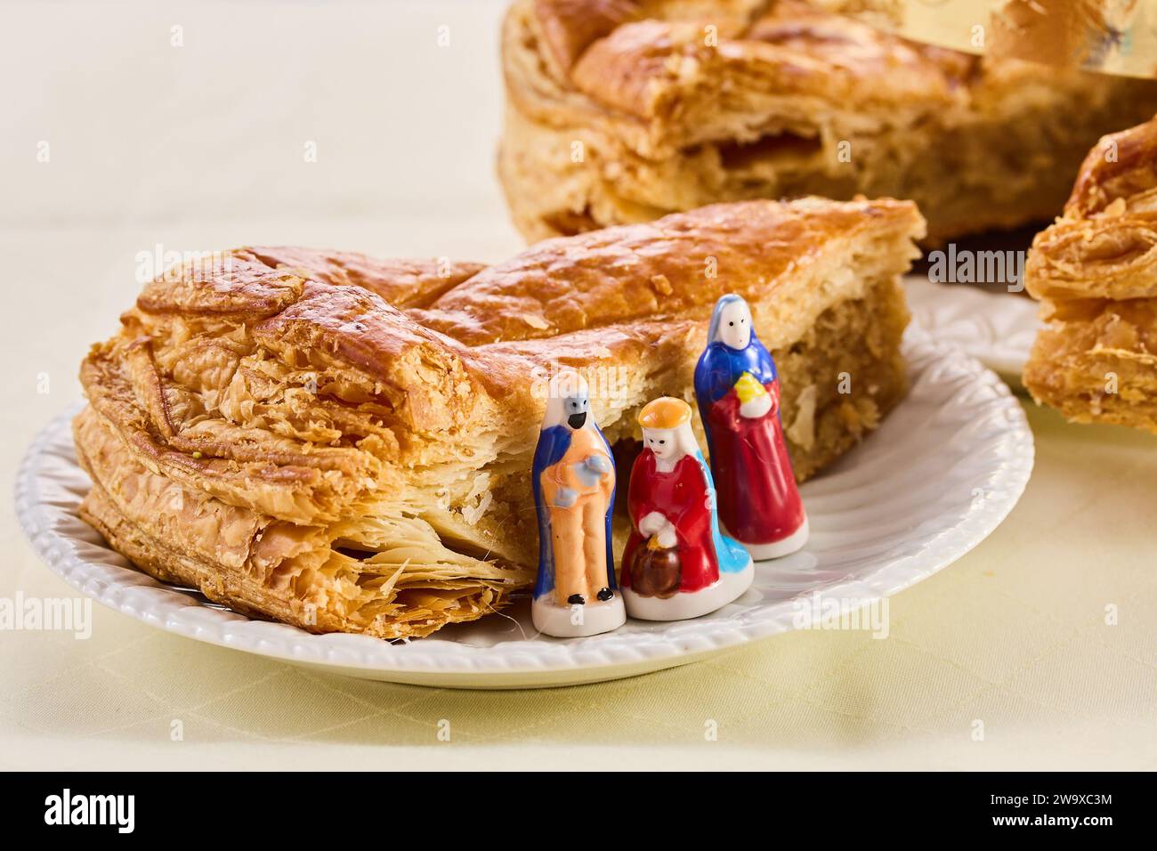 Epiphany cake on wooden table. Galette des rois traditional Epiphany ...