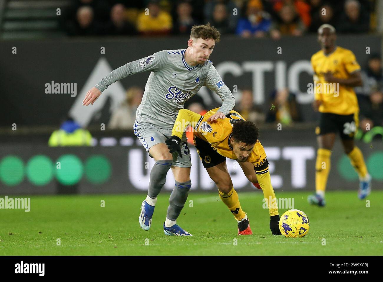 Wolverhampton, UK. 30th Dec, 2023. James Garner of Everton (l) and Joao ...