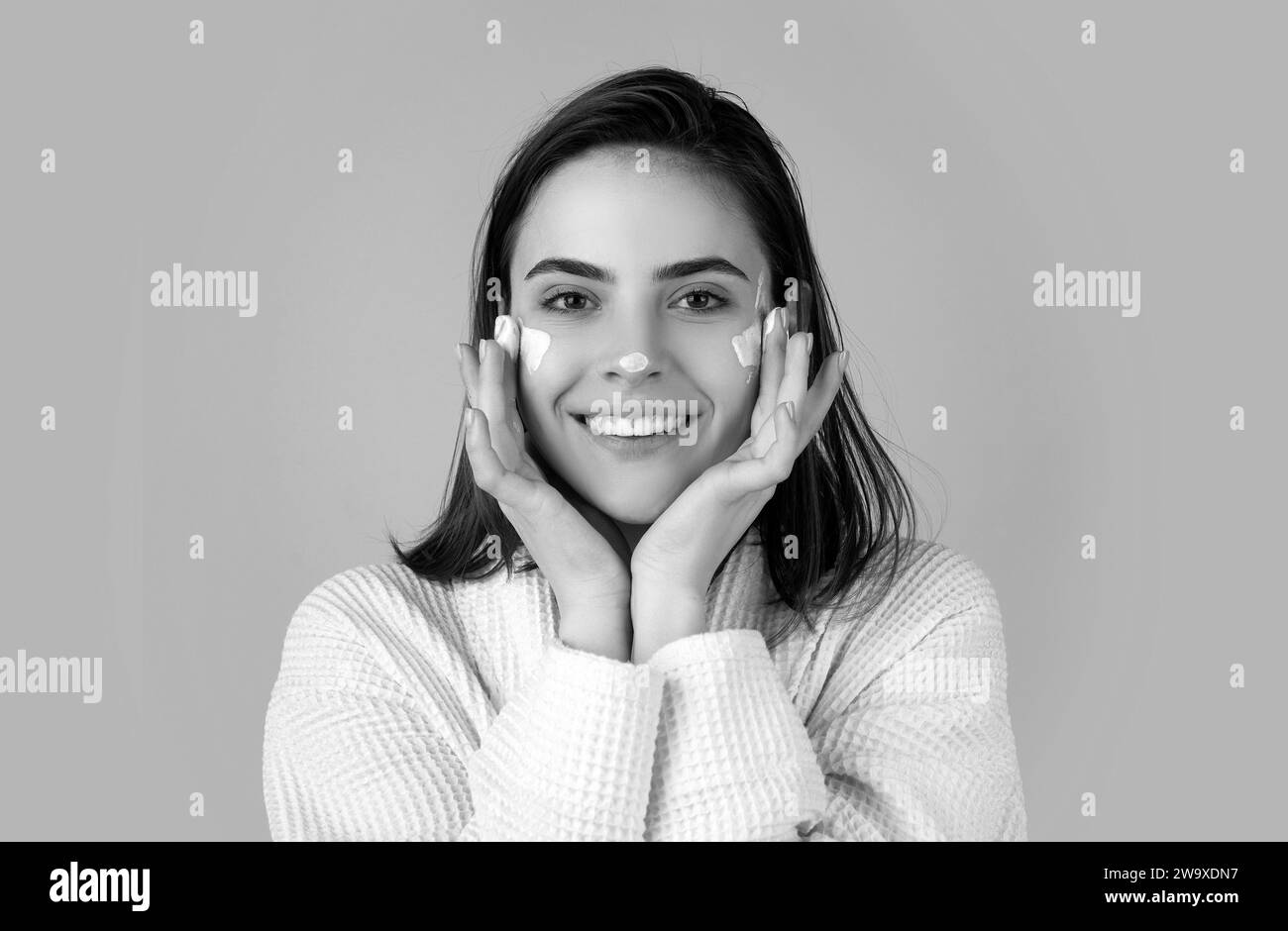 Beauty happy woman apply facial cream lifting nourishing day creme on ...