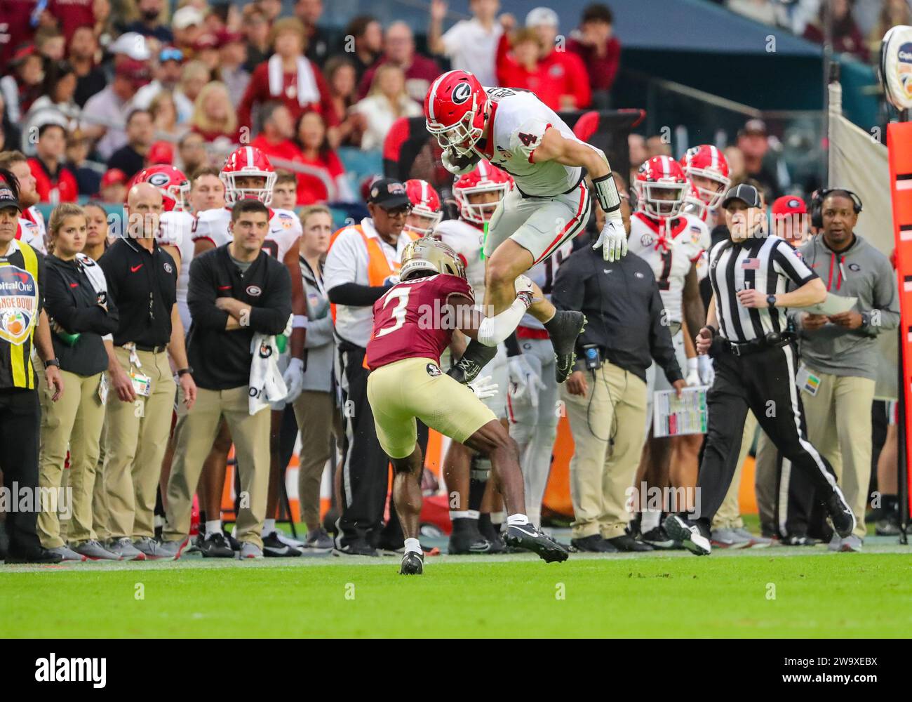 December 30, 2023:.Georgia Bulldogs tight end Oscar Delp (4) tries to ...