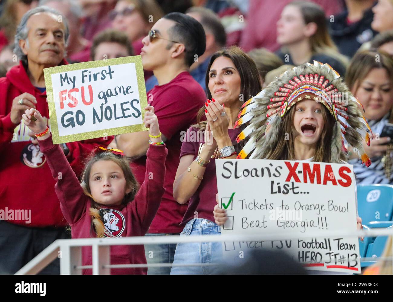 December 30, 2023:.Florida State Seminoles fans showing their signs ...