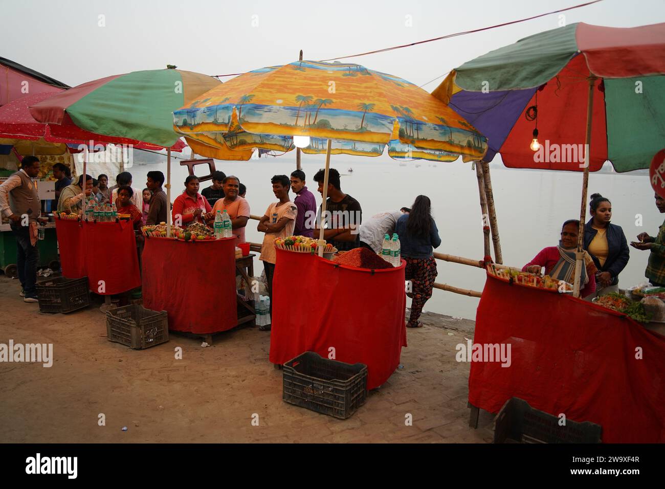 Uluberia, West Bengal, India. 30th Dec, 2023. Along the glimmering ...