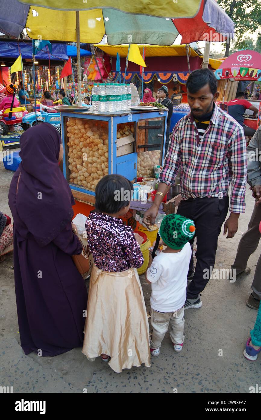 Uluberia, West Bengal, India. 30th Dec, 2023. Along the glimmering ...
