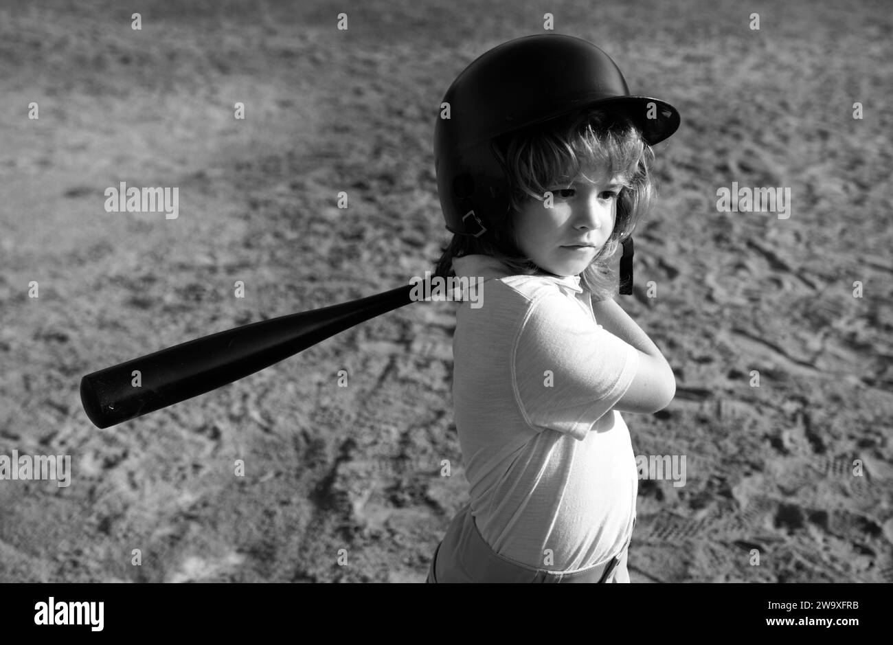 Baseball kid players in helmet and baseball bat in action Stock Photo ...
