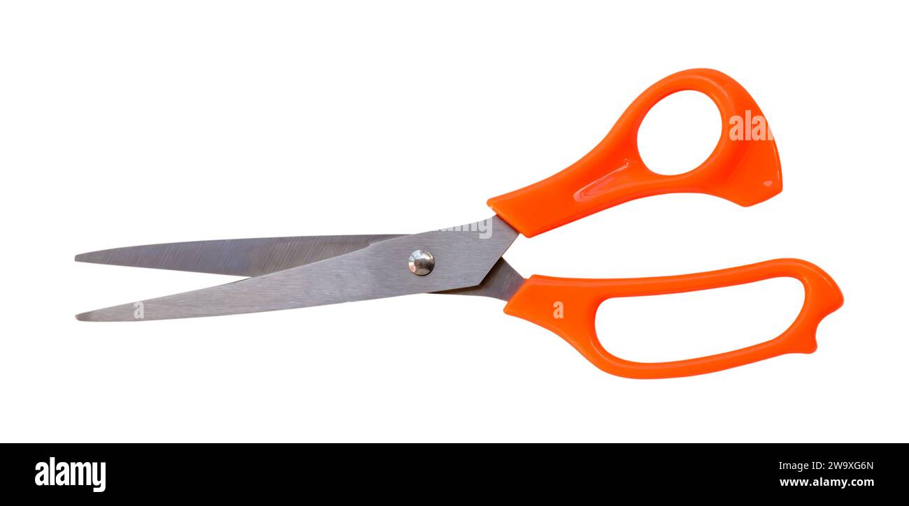 Multipurpose scissors with orange handle is isolated on white ...