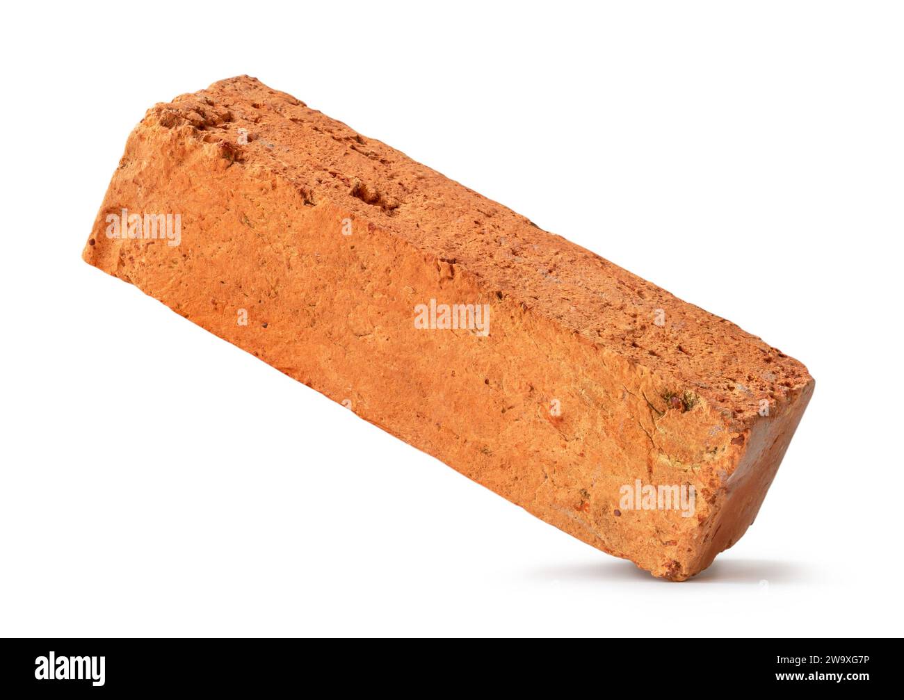 Single cracked old red or orange brick is isolated on white background ...