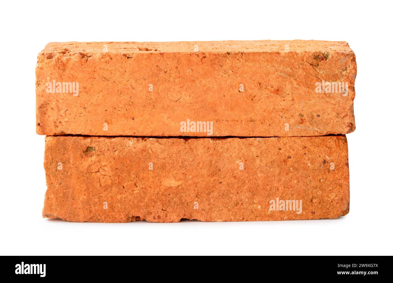 Front view of old red or orange cracked bricks in stack is isolated on ...