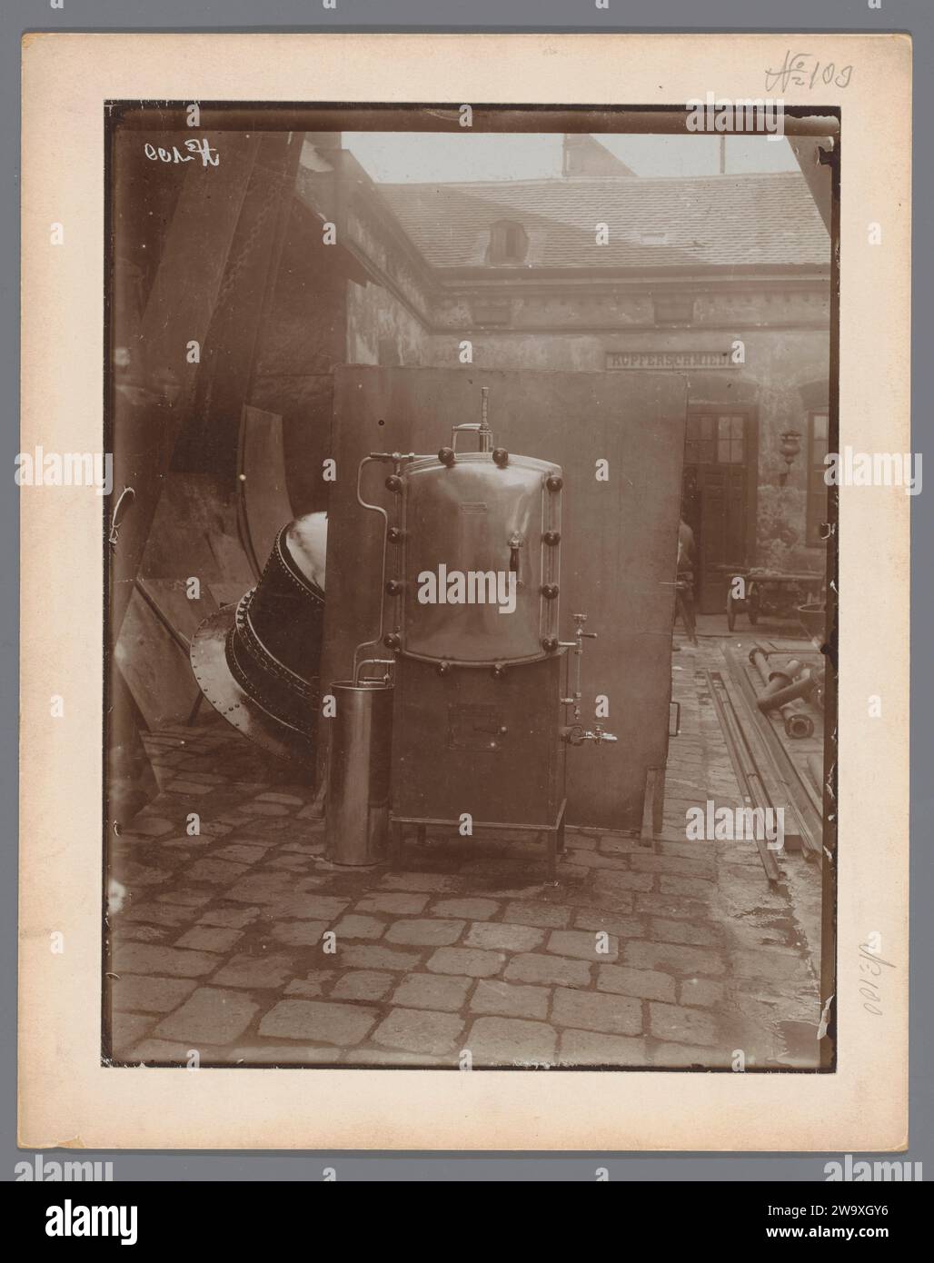 Machine in the courtyard of a buyer's forge, 1880 - 1920 photograph ...
