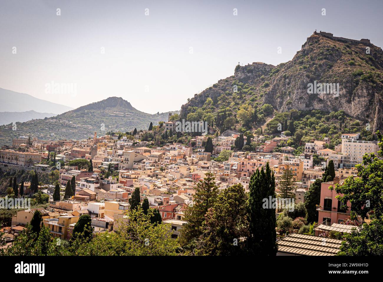 Aerial view of old town of Taormina on sunny day from ancient greek ...