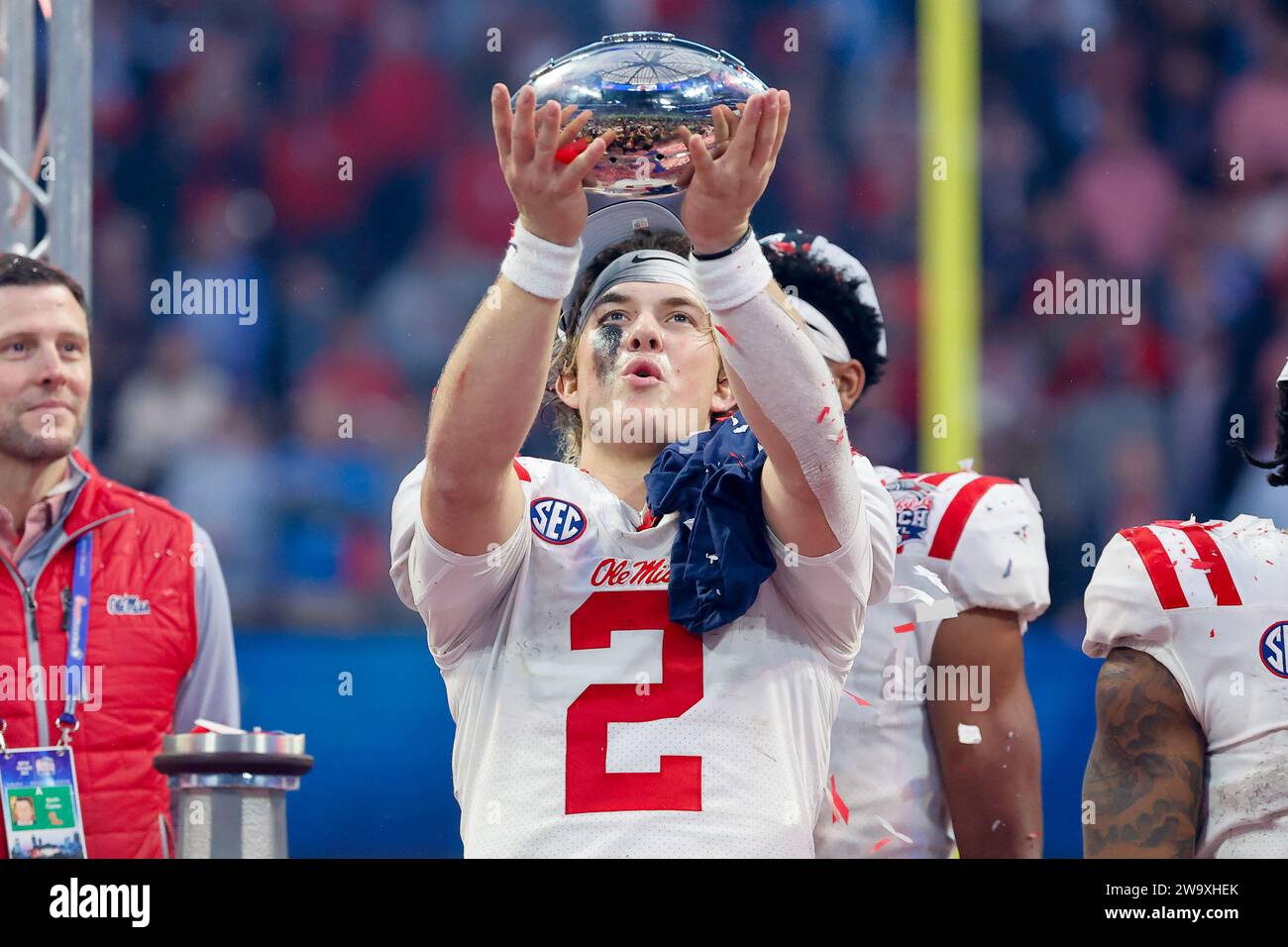 Atlanta, Georgia. 30th Dec, 2023. Jaxson Dart of Ole Miss holds the ...