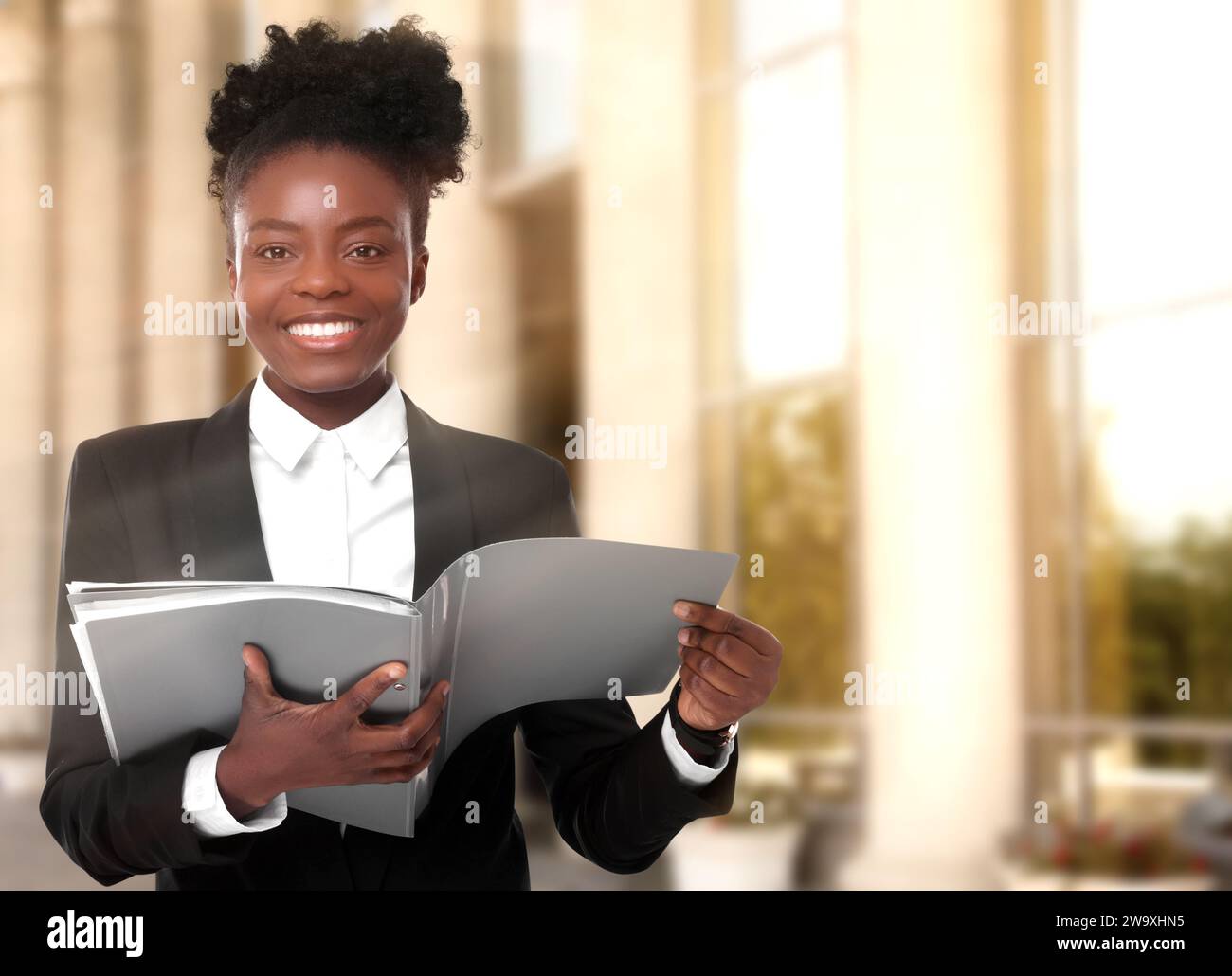 Lawyer, consultant, business owner. Confident woman with file folders ...