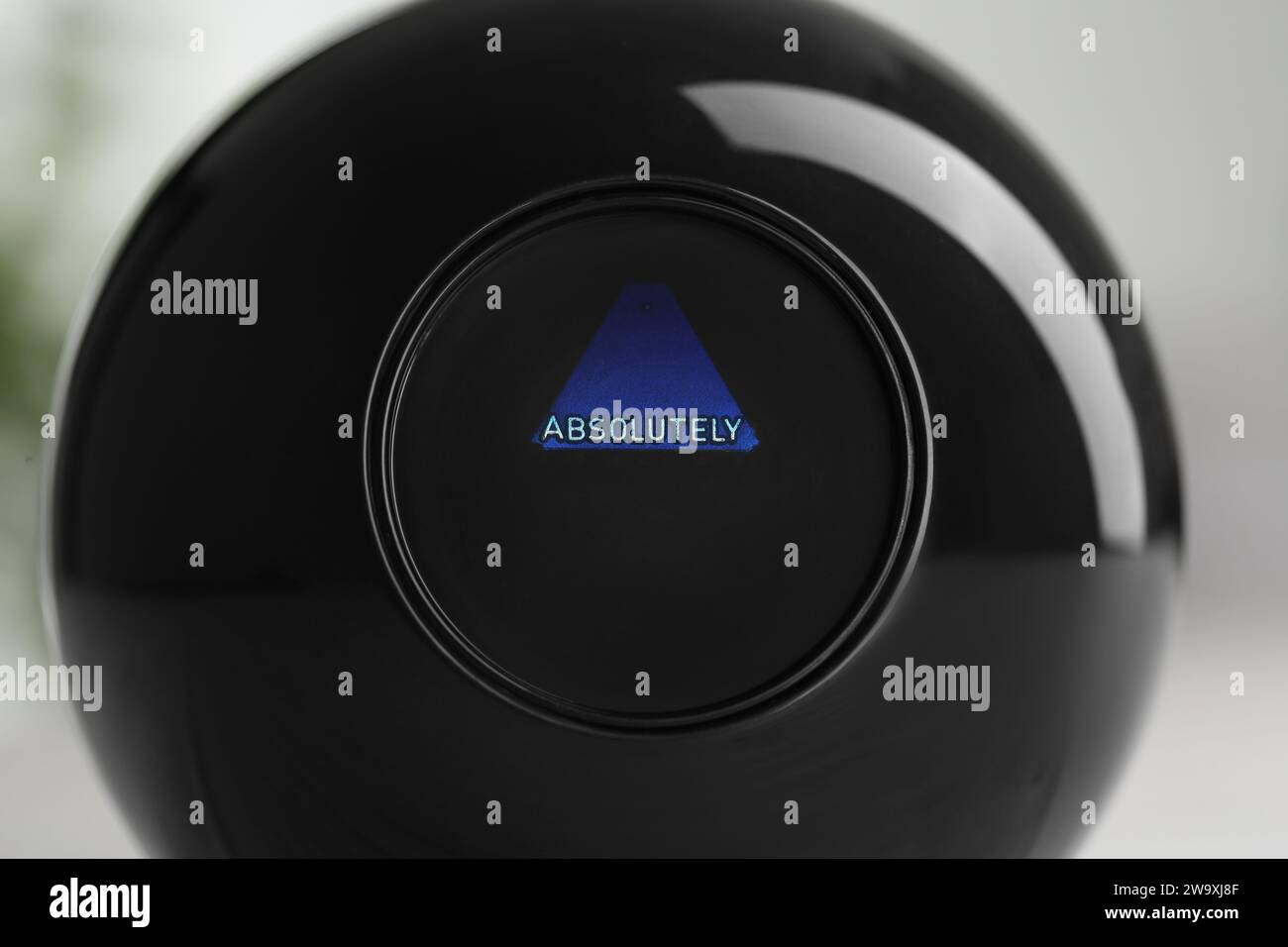 Magic eight ball with prediction Absolutely on light background ...