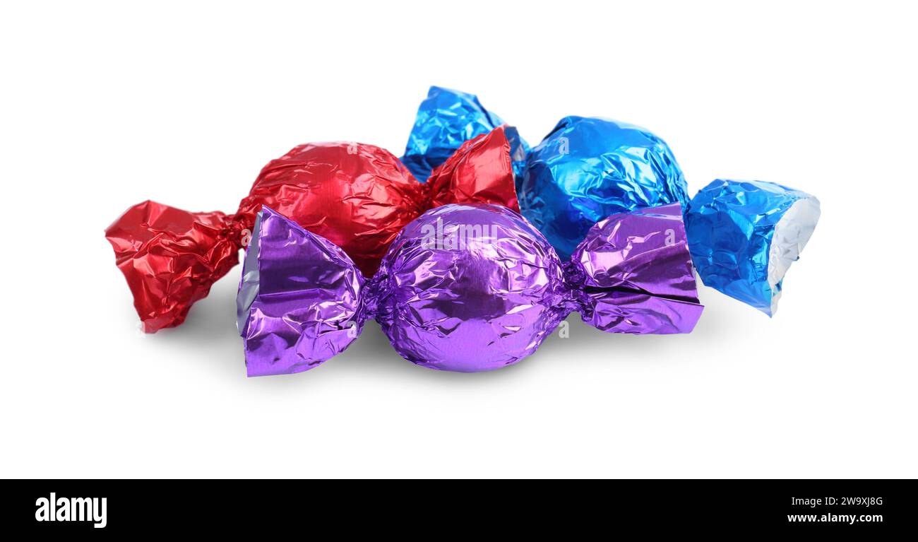 Tasty candies in colorful wrappers isolated on white Stock Photo - Alamy