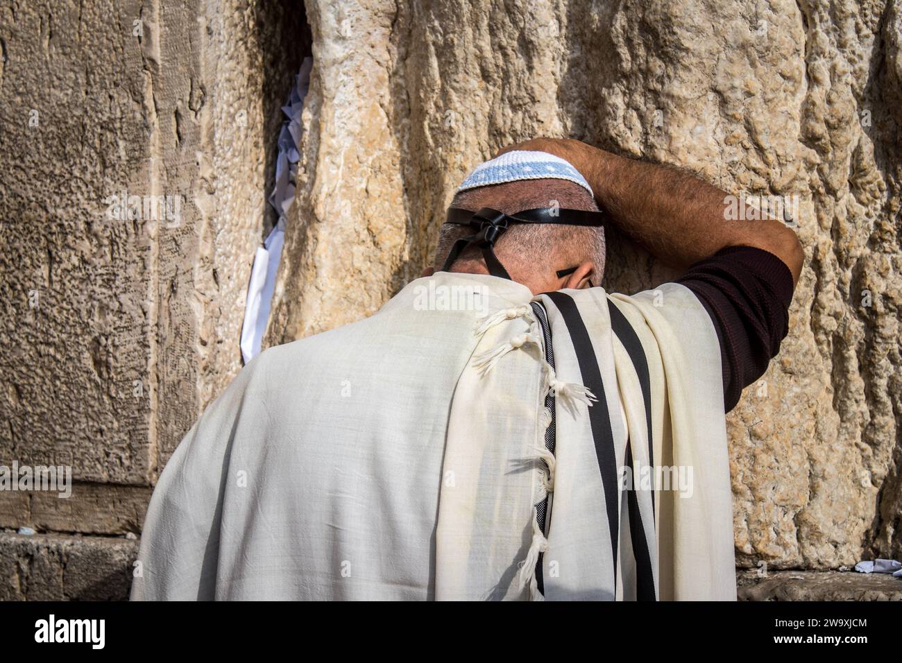 Jerusalem, Israel – December 28, 2023 Jewish praying at the Western ...