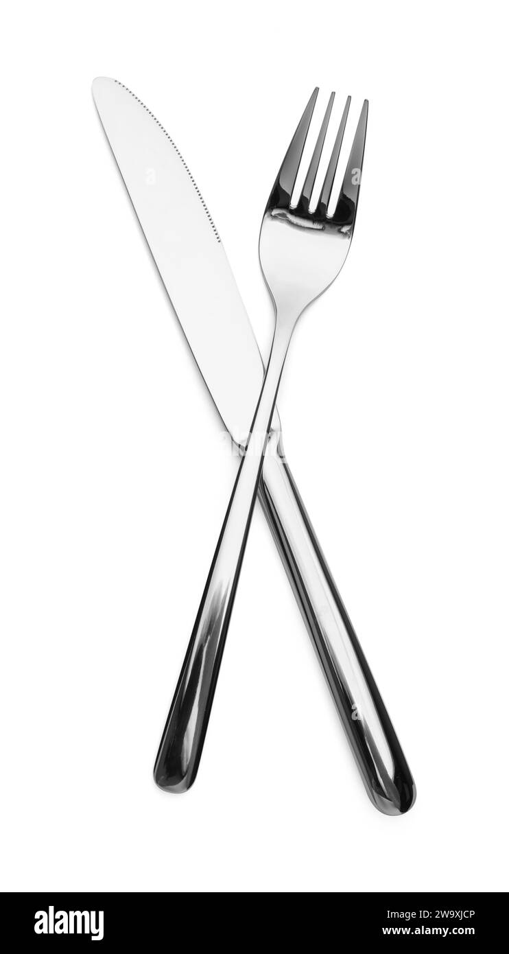 Shiny silver fork and knife isolated on white. Luxury cutlery Stock ...