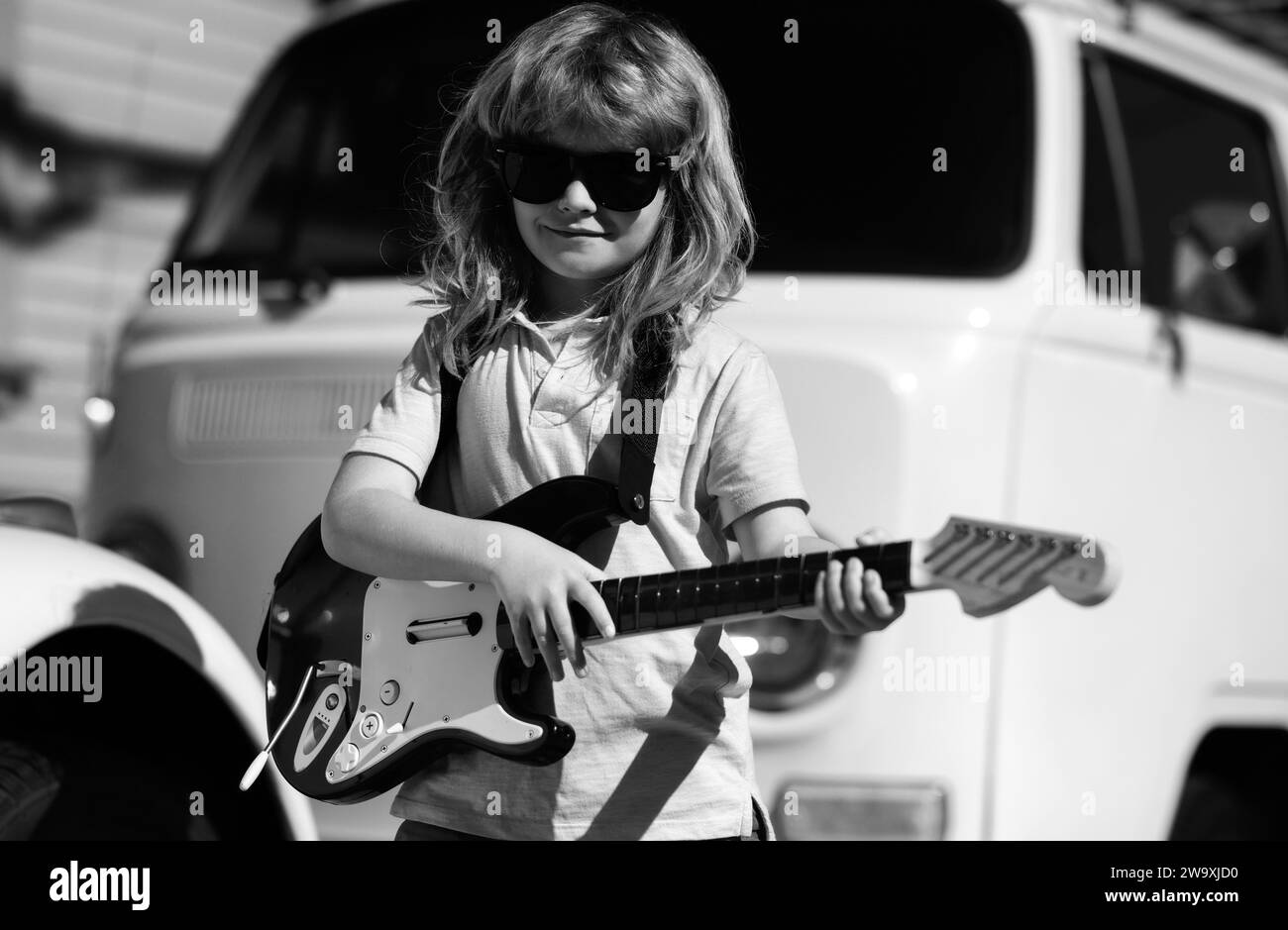 Kids musical instruments. Child musician guitarist playing electric ...