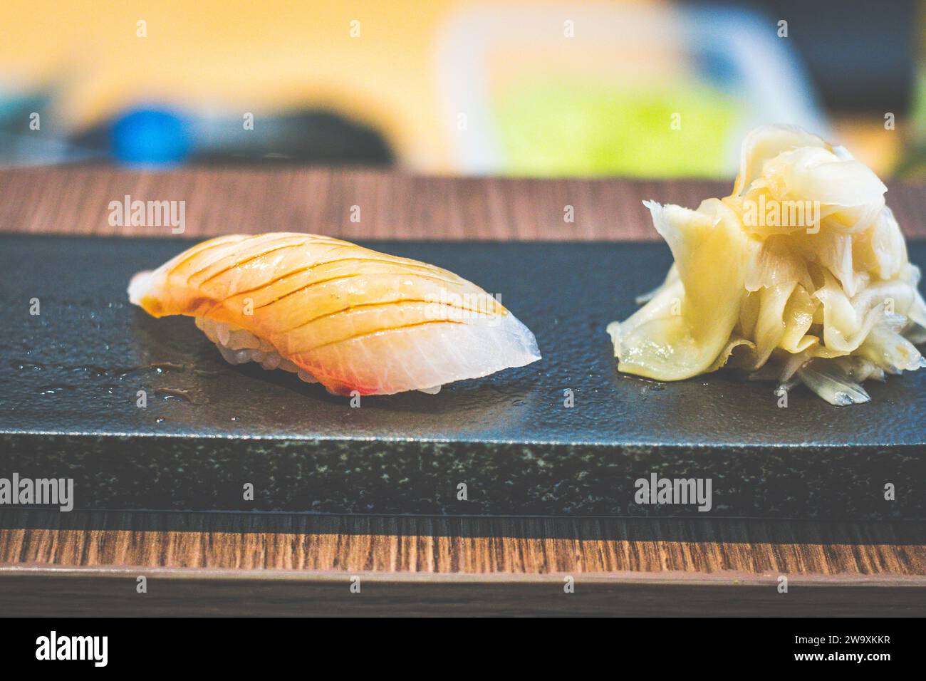 one serving of japanese nigiri rice sushi served with japanese pickled ...