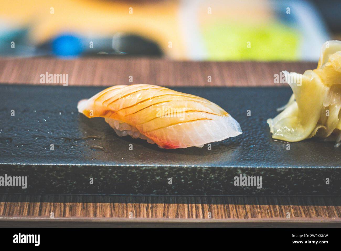 one serving of japanese nigiri rice sushi served with japanese pickled ...