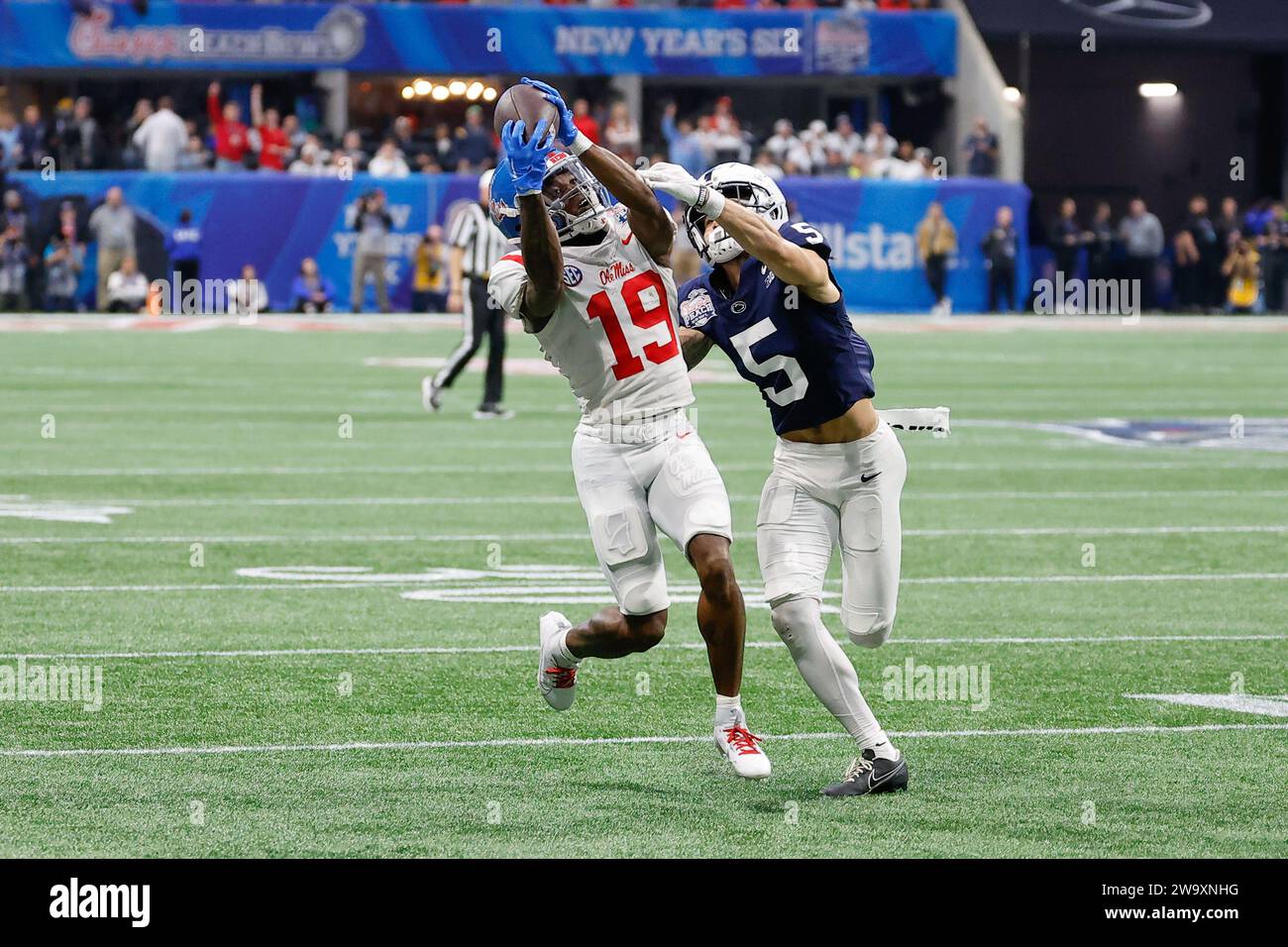 Atlanta, Georgia. 30th Dec, 2023. Dayton Wade (19) of Ole Miss makes a ...