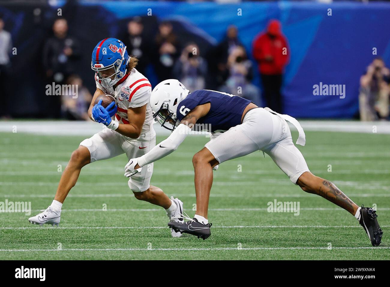 Atlanta, Georgia. 30th Dec, 2023. Cayden Lee of Ole Miss is brought ...