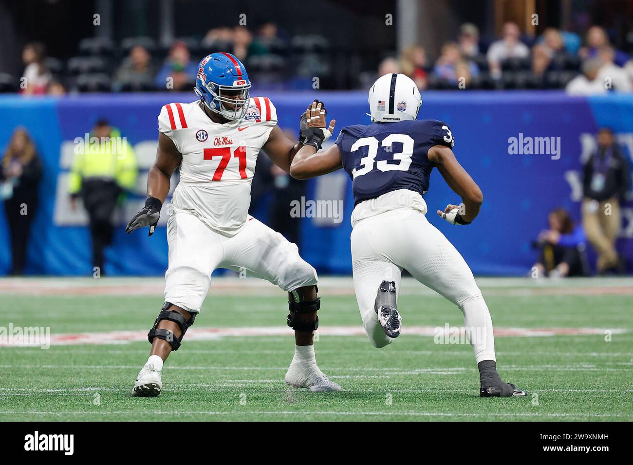 Atlanta, Georgia. 30th Dec, 2023. Jayden Williams (71) of Ole Miss in ...