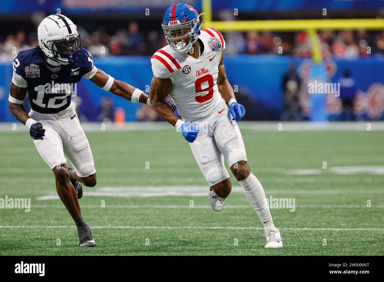 Atlanta, Georgia. 30th Dec, 2023. Tre Harris (9) of Ole Miss works ...