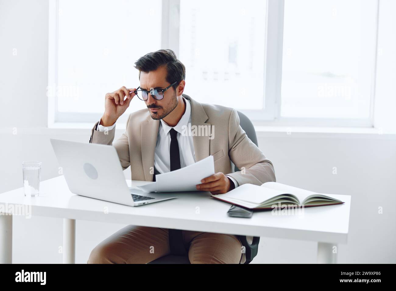 Paper planning holding businessman office Stock Photo - Alamy